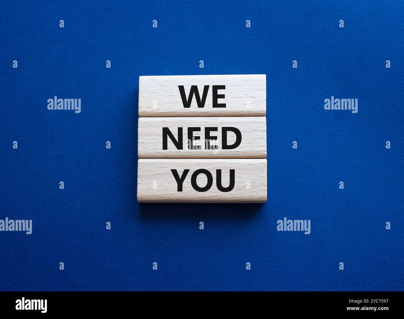 We need you symbol. Concept words We need you on wooden blocks ...