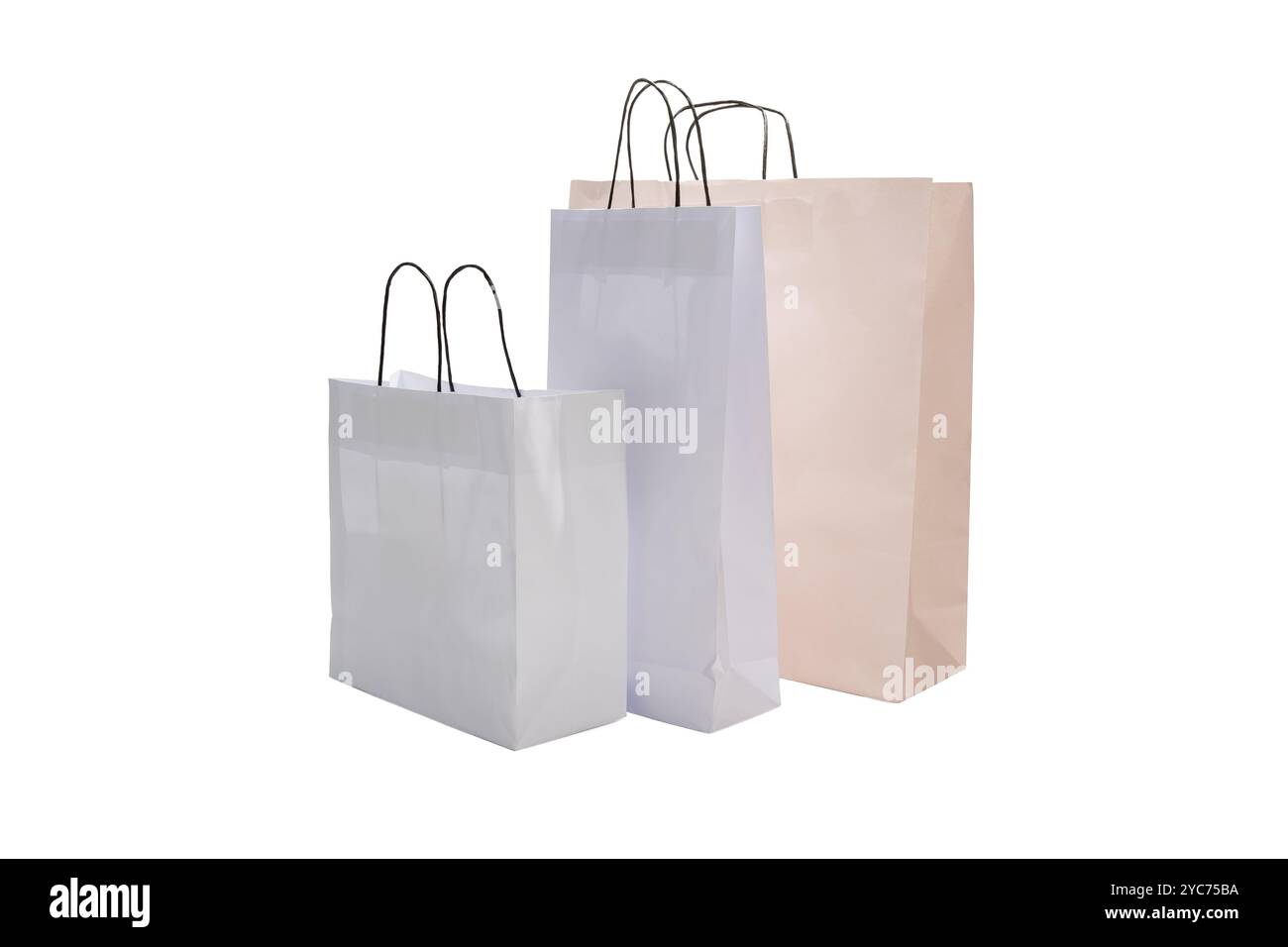 Three white paper bags with handles. The bags are of different sizes ...