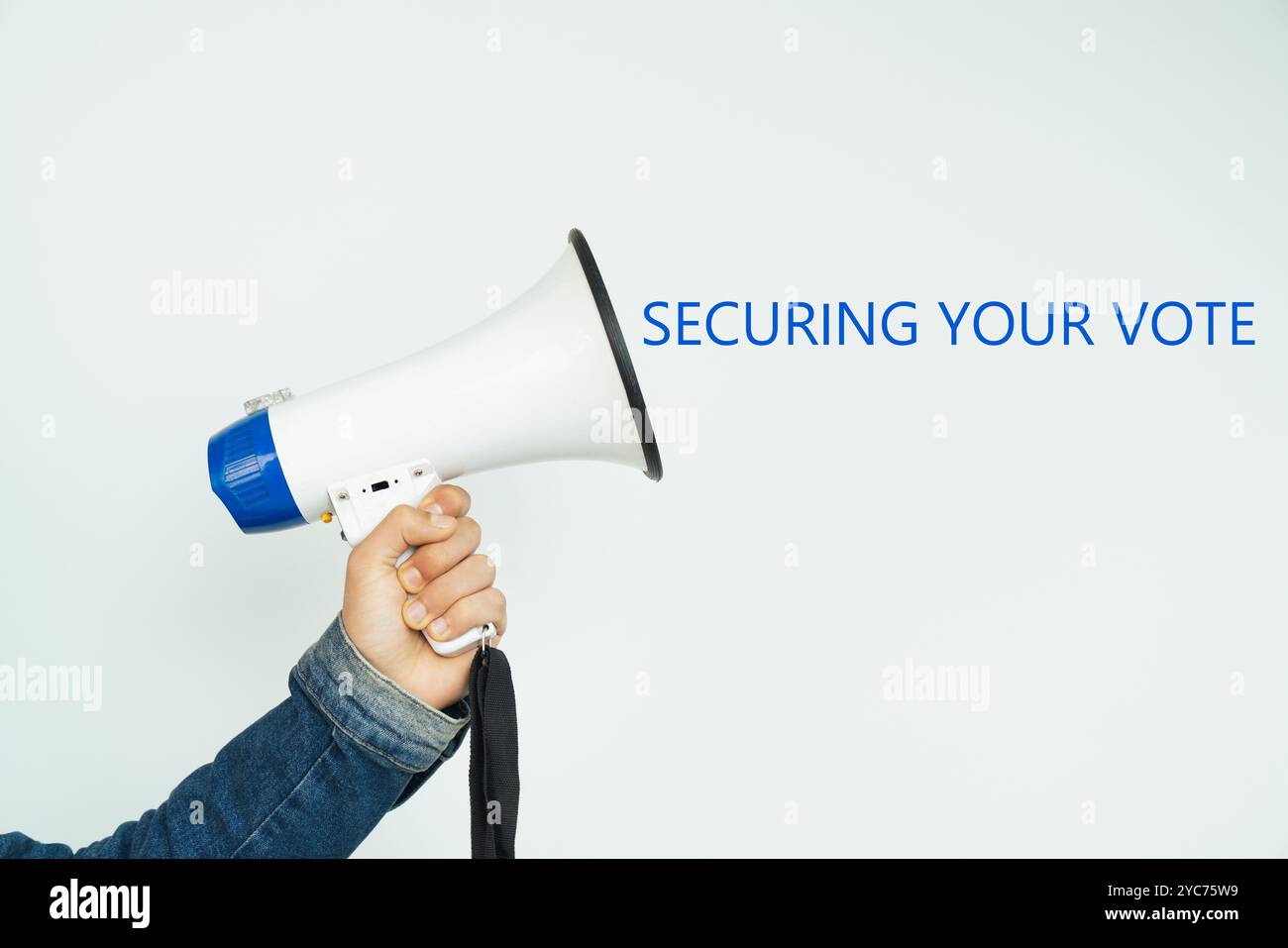 hand holding megaphone and Securing Your Vote text Stock Photo - Alamy