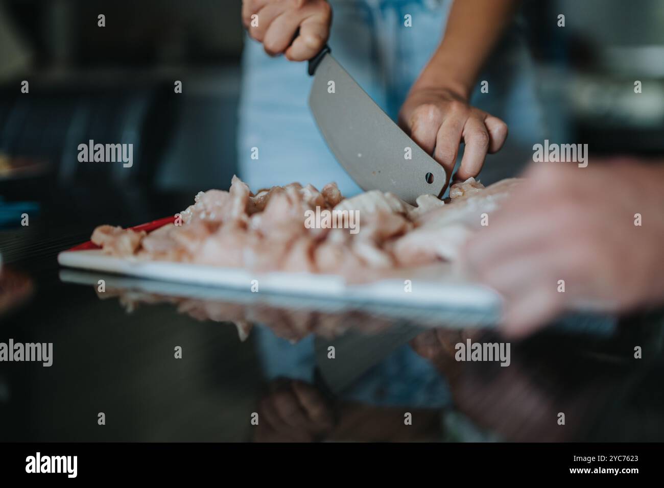Dicing chicken meat on kitchen hi-res stock photography and images - Alamy
