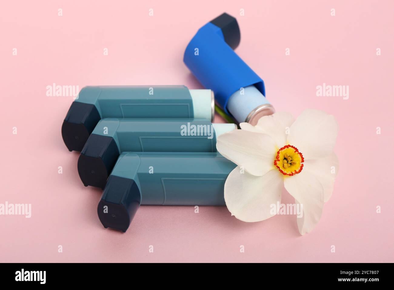 Modern inhalers with daffodil flower on pink background Stock Photo - Alamy