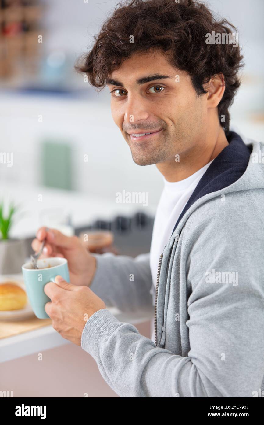 healthy adult man having breakfast in apartment Stock Photo - Alamy