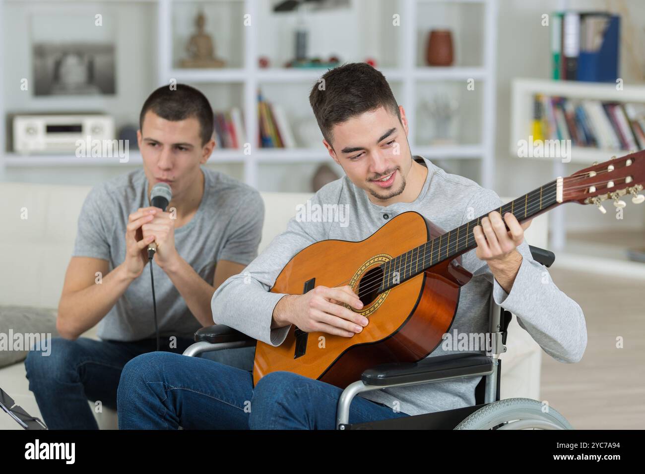 Two boys singing hi-res stock photography and images - Alamy