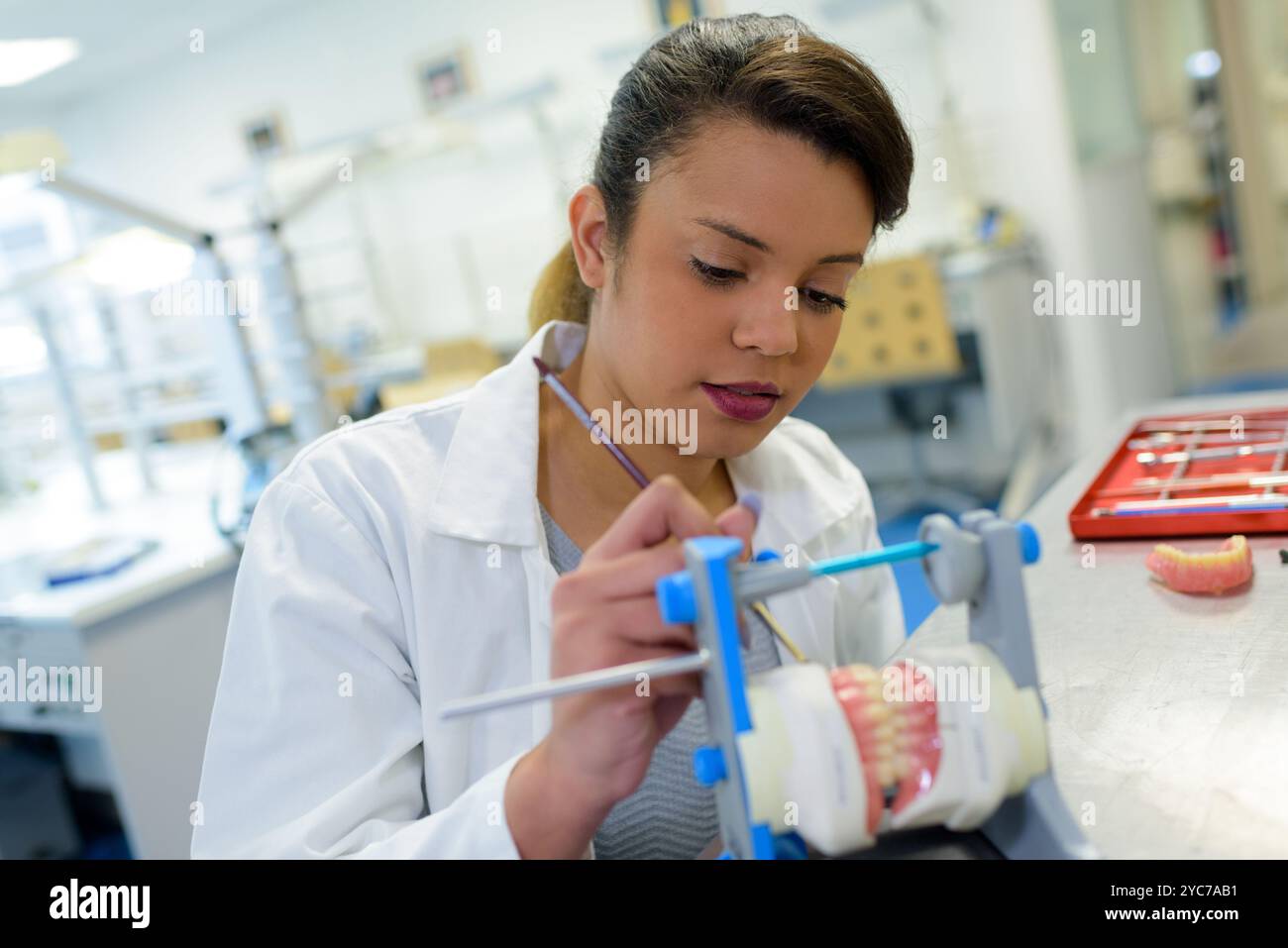 dental technician working on prosthesis Stock Photo - Alamy