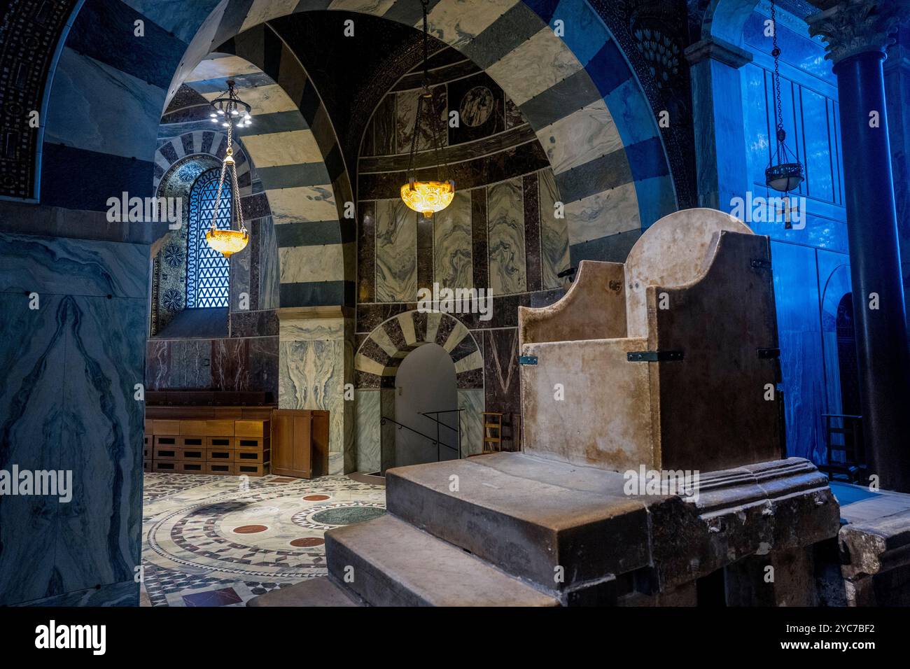 The throne of Charlemagne in the Aachen Cathedral (UNESCO’s World Heritage Site) which is the ...