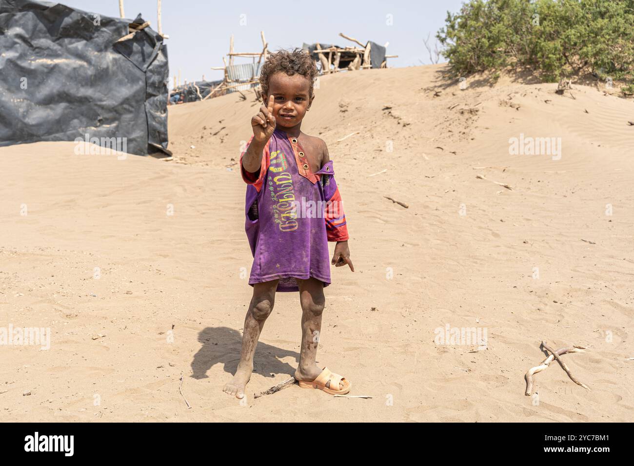 Close-up of an Afar boy in the village of Ahmed Ela, Danakil depression ...