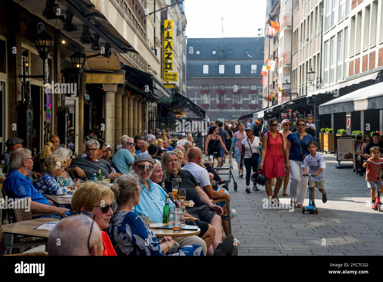 A street scene in the narrow streets of Altstadt, Düsseldorf’s old town, are home to chic ...