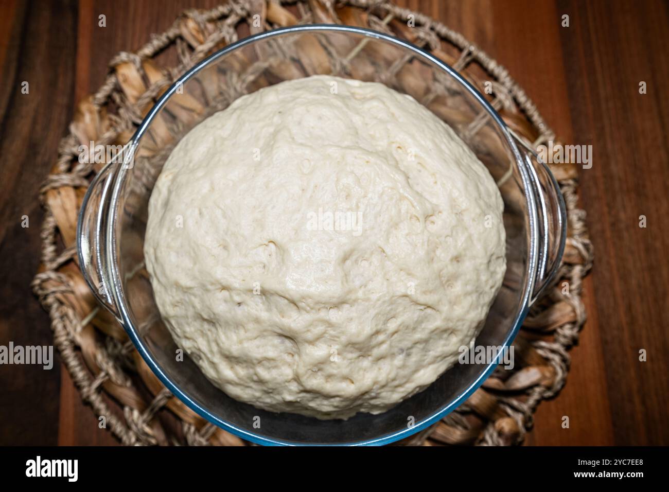 Kneaded and fermented dough in a bowl Stock Photo - Alamy