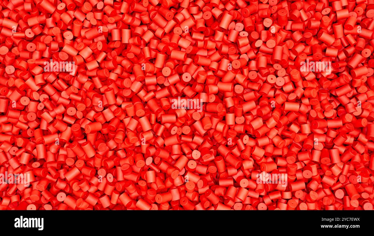 Closeup top view of red plastic polypropylene granules, masterbatch ...