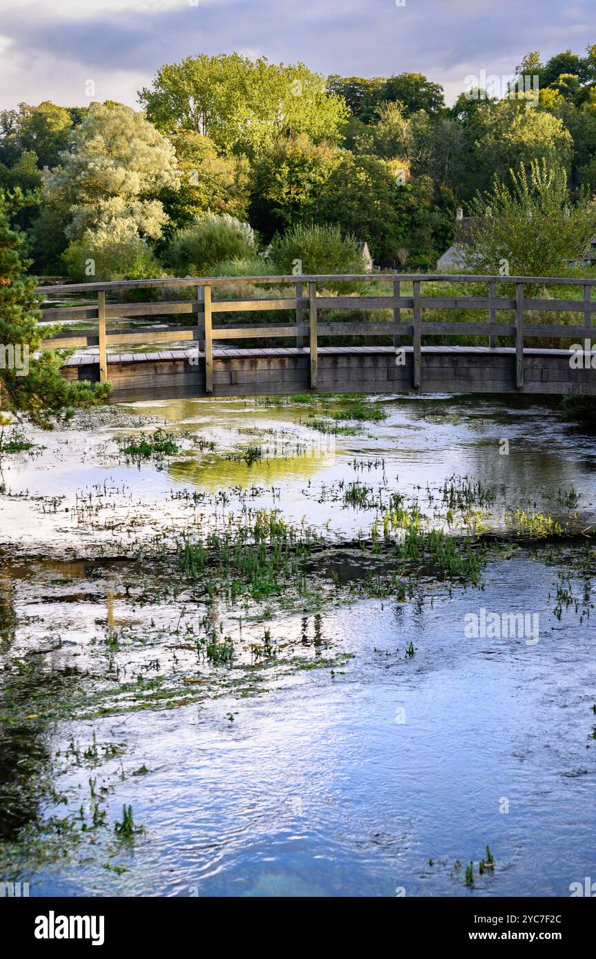 Wooden bridge over the river Coln at Bibury England Stock Photo - Alamy