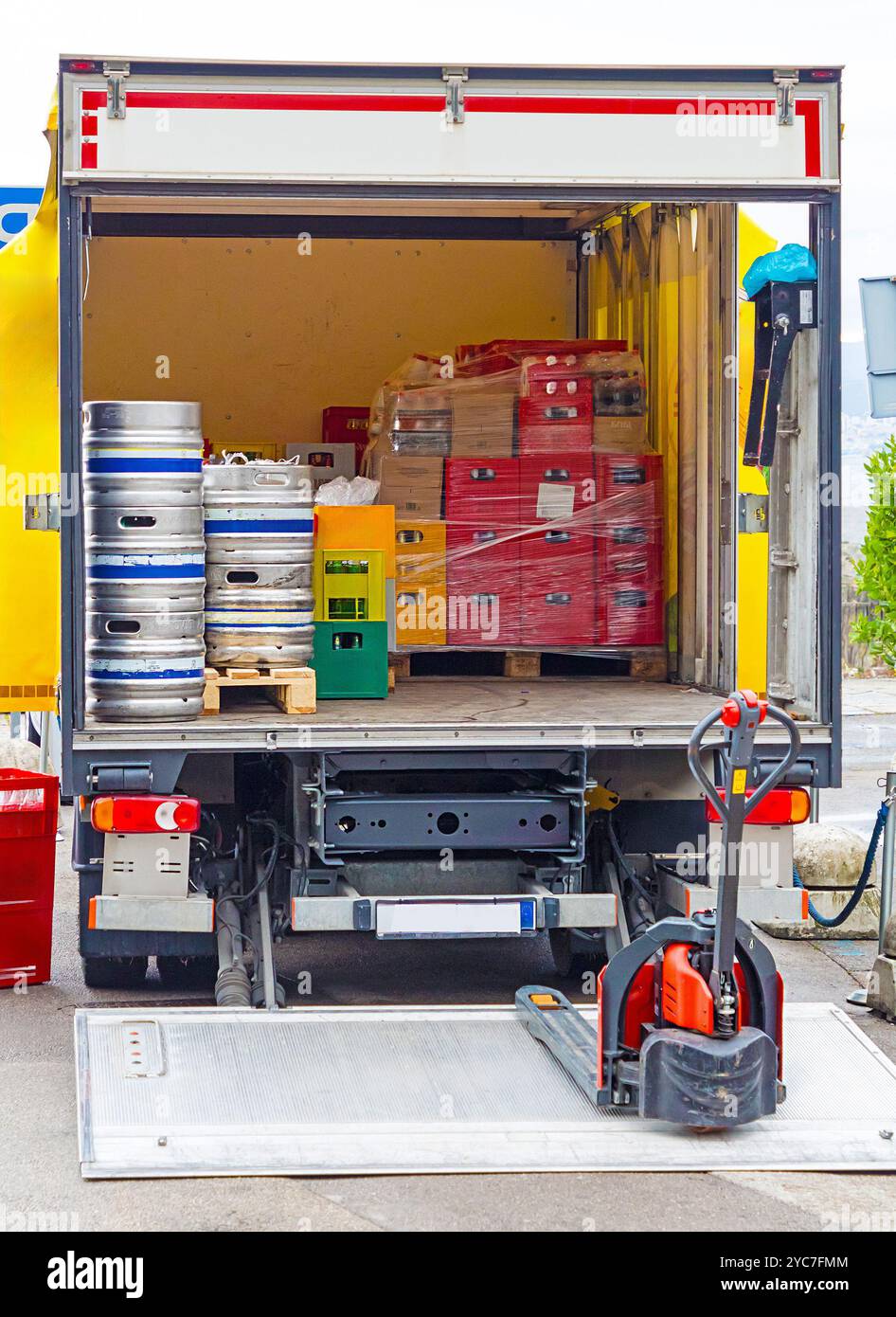 Open van truck storage door with bunch of alcohol bottles beer and hard ...