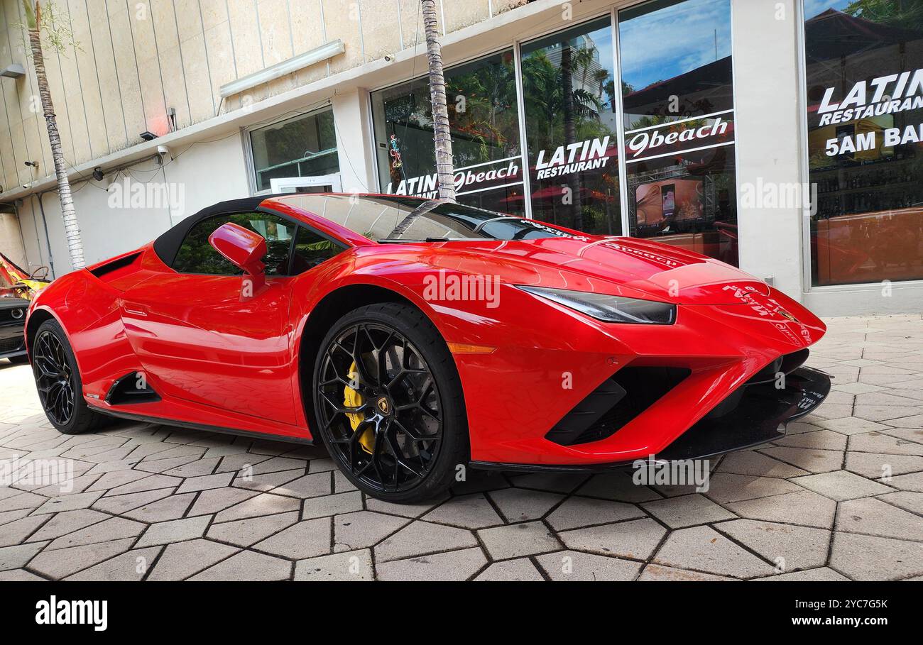 Miami Beach, Florida USA - June 8, 2024: Lamborghini Huracan red at Miami beach. Lamborghini is ...