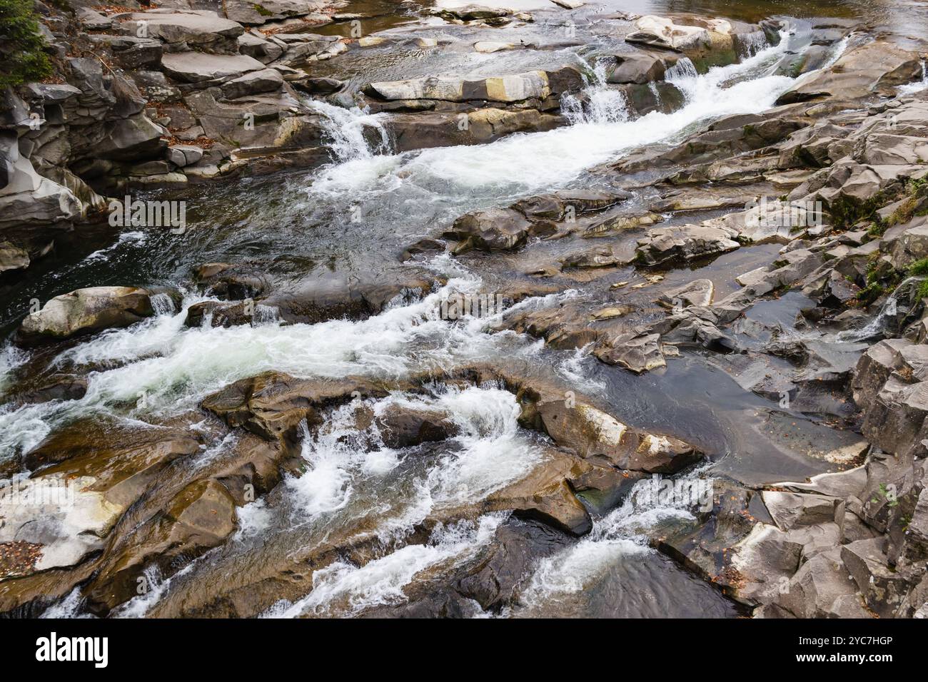 Mountain river with stones. Rafting river in forest. Splashy fast river ...