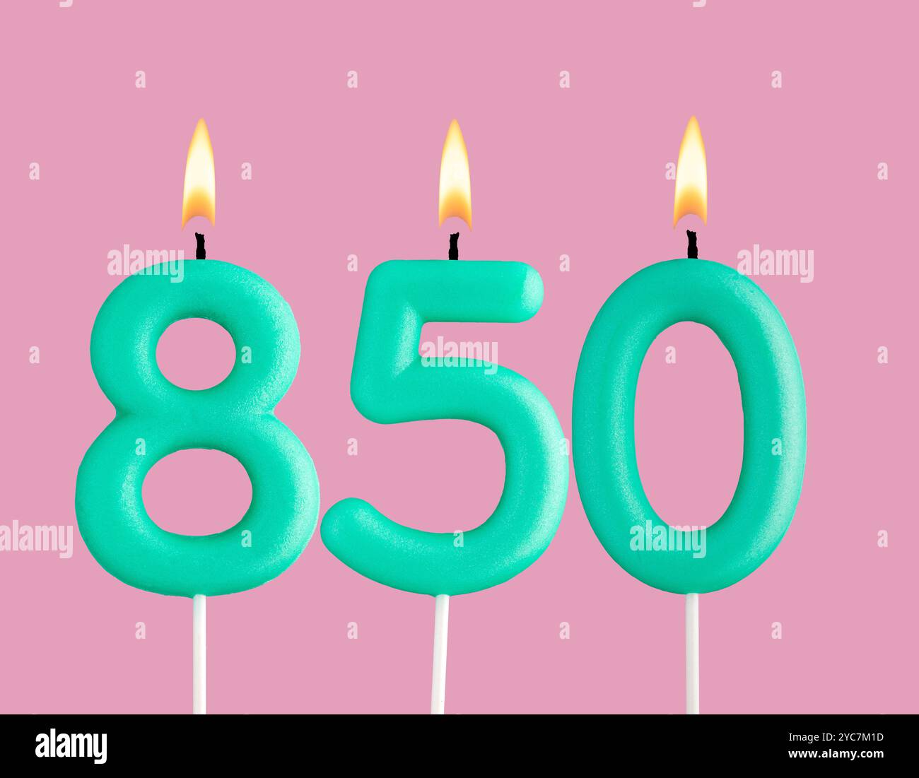 Green candle number 850 - Birthday card on pastel pink background Stock ...