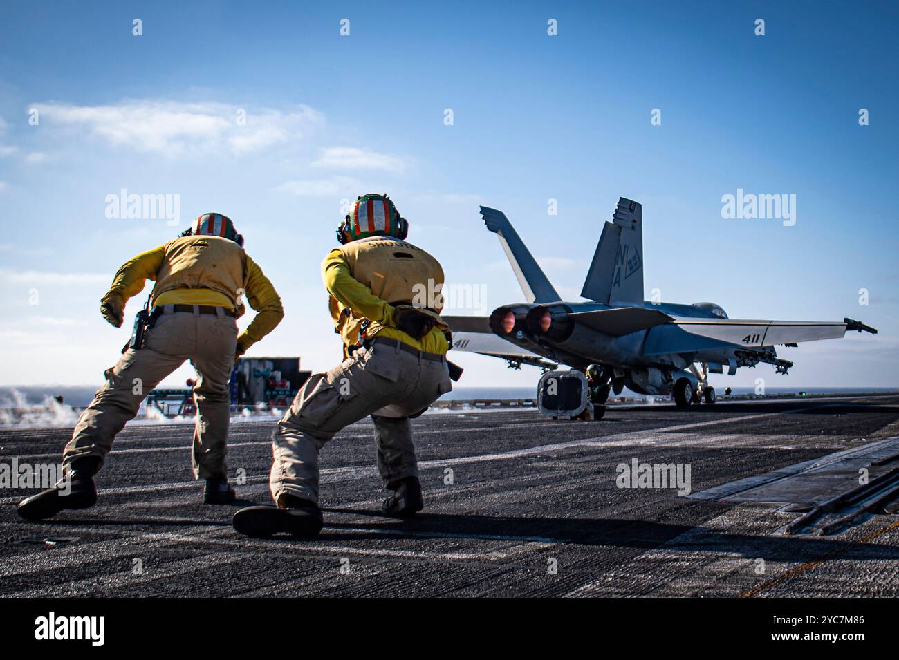 USS Nimitz, United States. 11 October, 2024. U.S. Navy shooters watch ...
