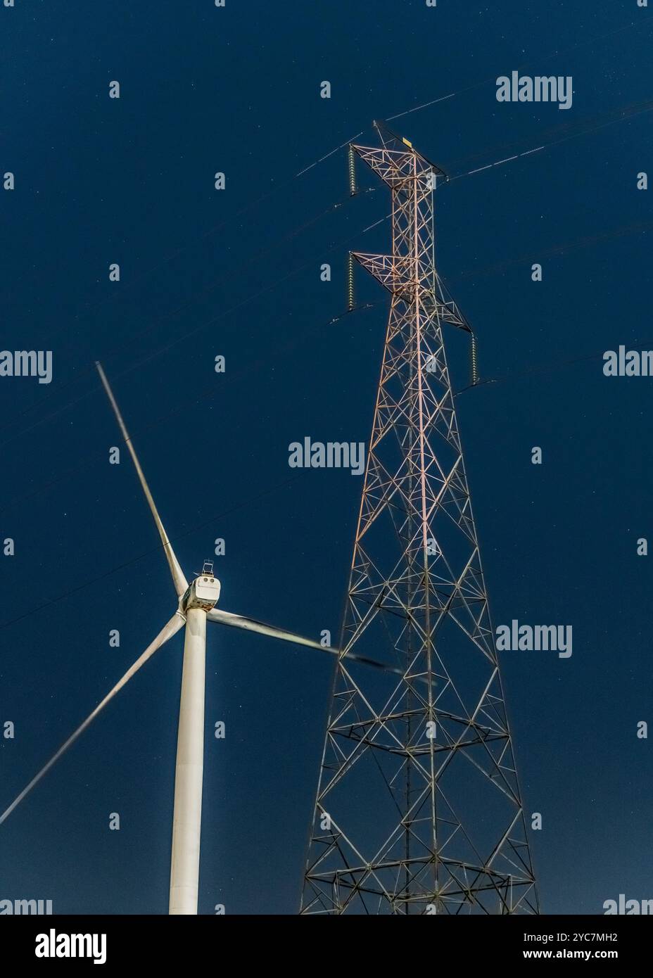 Wind energy tower and high-voltage electricity transmission tower at ...