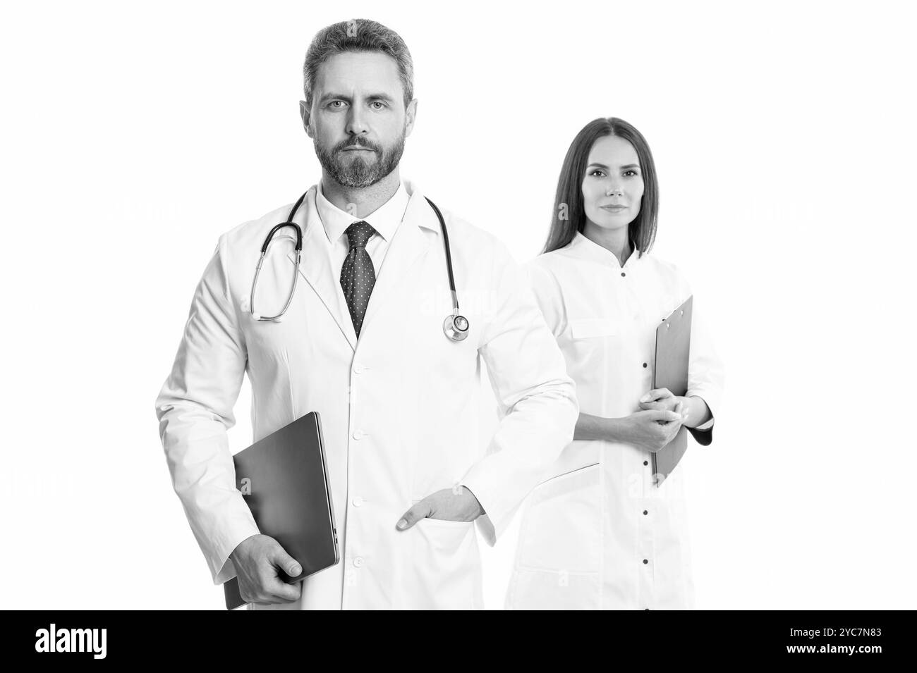 medical and healthcare workers in hospital isolated on white. two ...