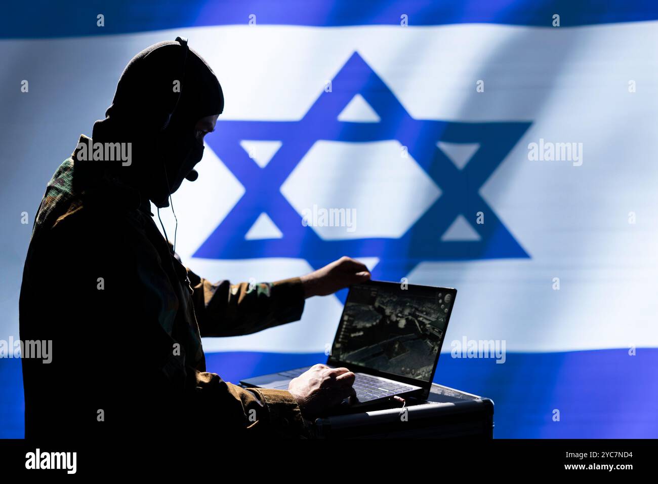 Mossad operative using detection gear analyzing surveillance data ...