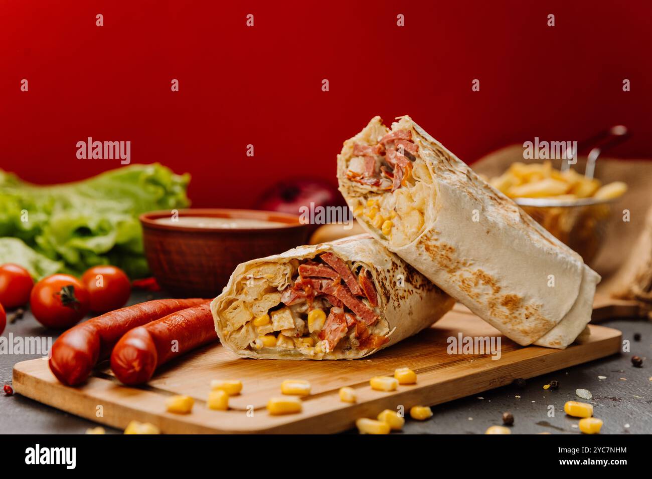 Grilled wrap filled with sausage, corn, and melted cheese. Hearty meal ...