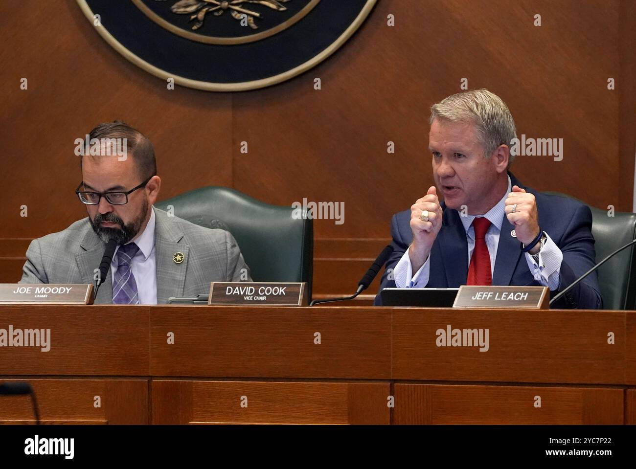State Rep. David Cook, R-Mansfield, right, poses a question during ...