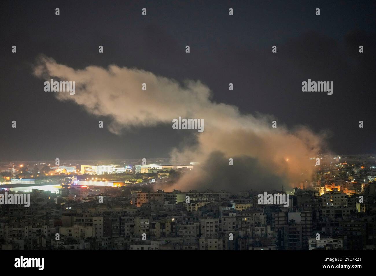 Smoke rises from an Israeli airstrike on Dahiyeh, in the southern ...