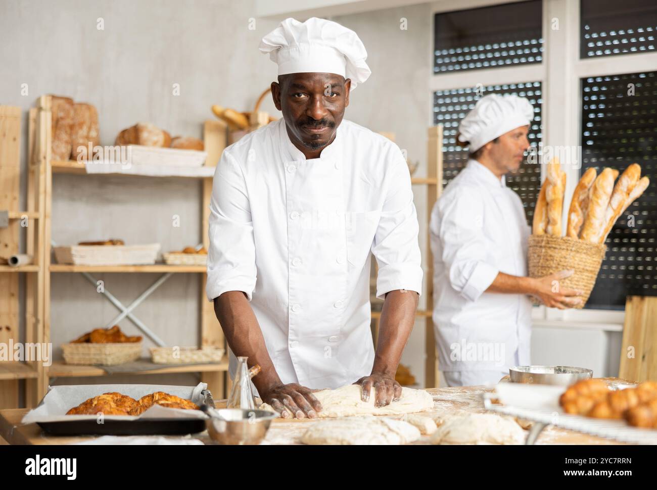 Smiling african artisan baker hi-res stock photography and images - Alamy