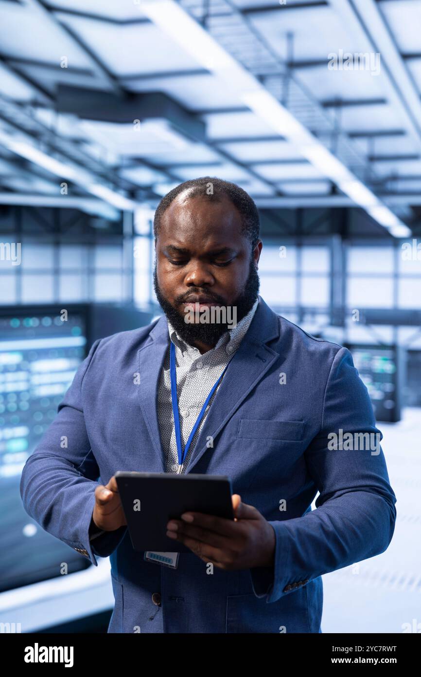 Data center team configuring hi-res stock photography and images - Alamy