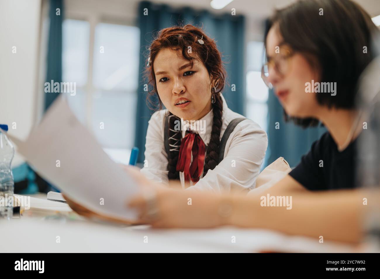 Female students collaborating on academic hi-res stock photography and images - Alamy