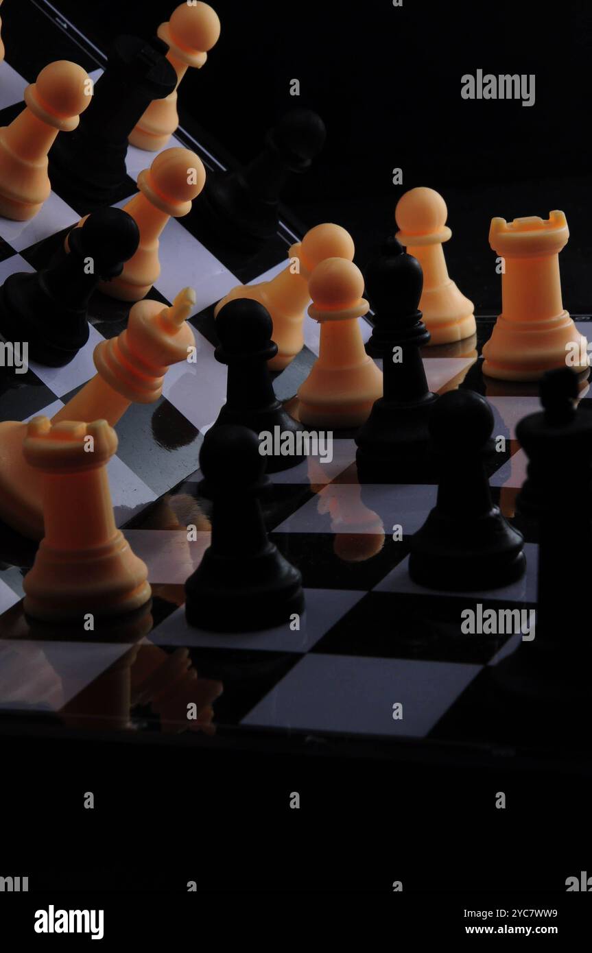 Intense chess game showcasing classic board game strategies Stock Photo ...