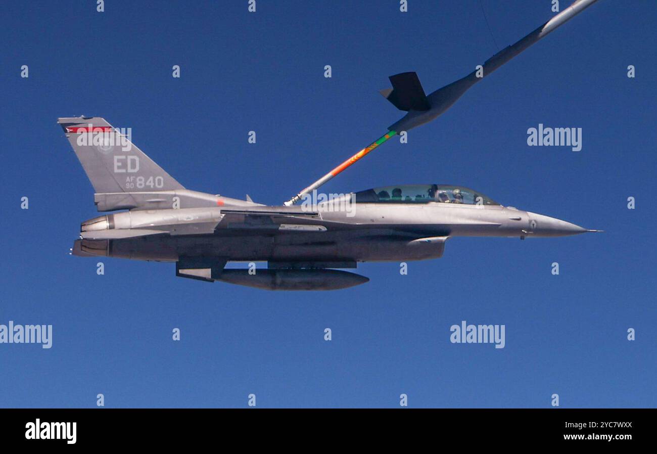 Edwards AFB civilian Aerial Photographer Richard Gonzales flies a photo ...