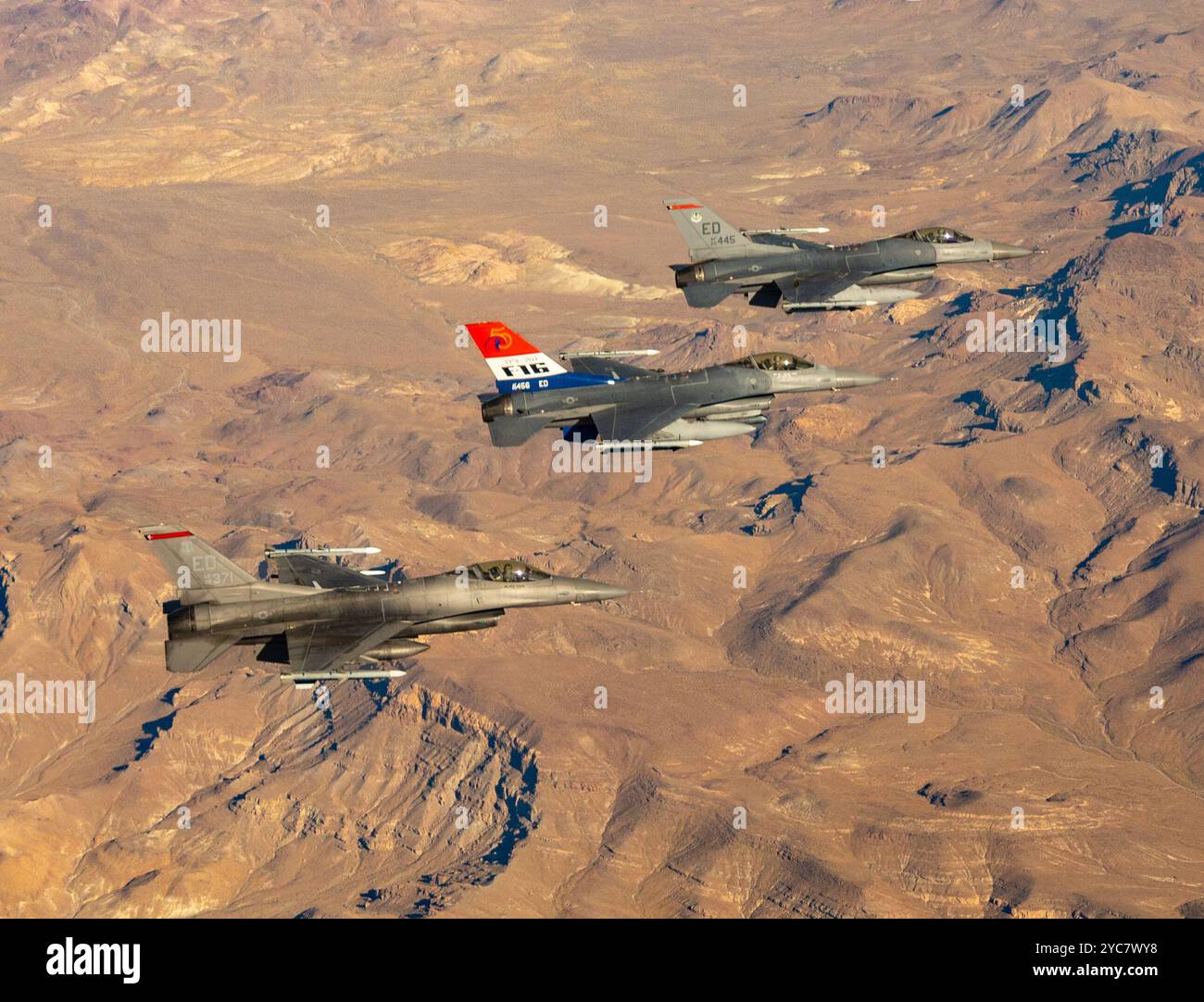 Three Air Force F-16Cs from Edwards AFB, CA practice formation flying ...