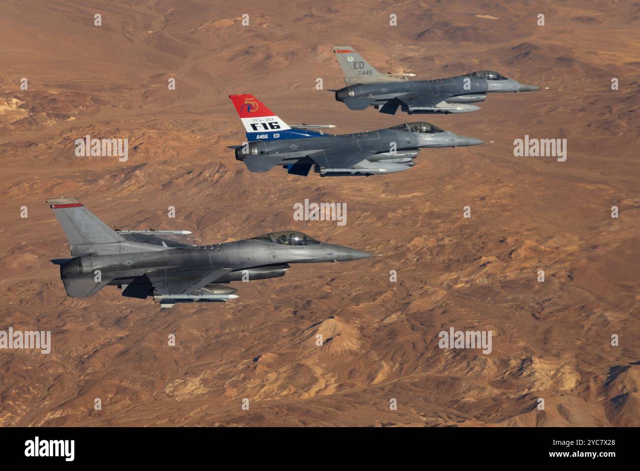 Three Air Force F-16Cs from Edwards AFB, CA practice formation flying ...