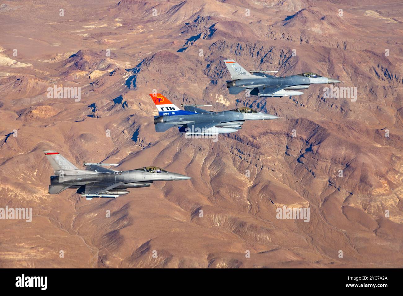 Three Air Force F-16Cs from Edwards AFB, CA practice formation flying ...