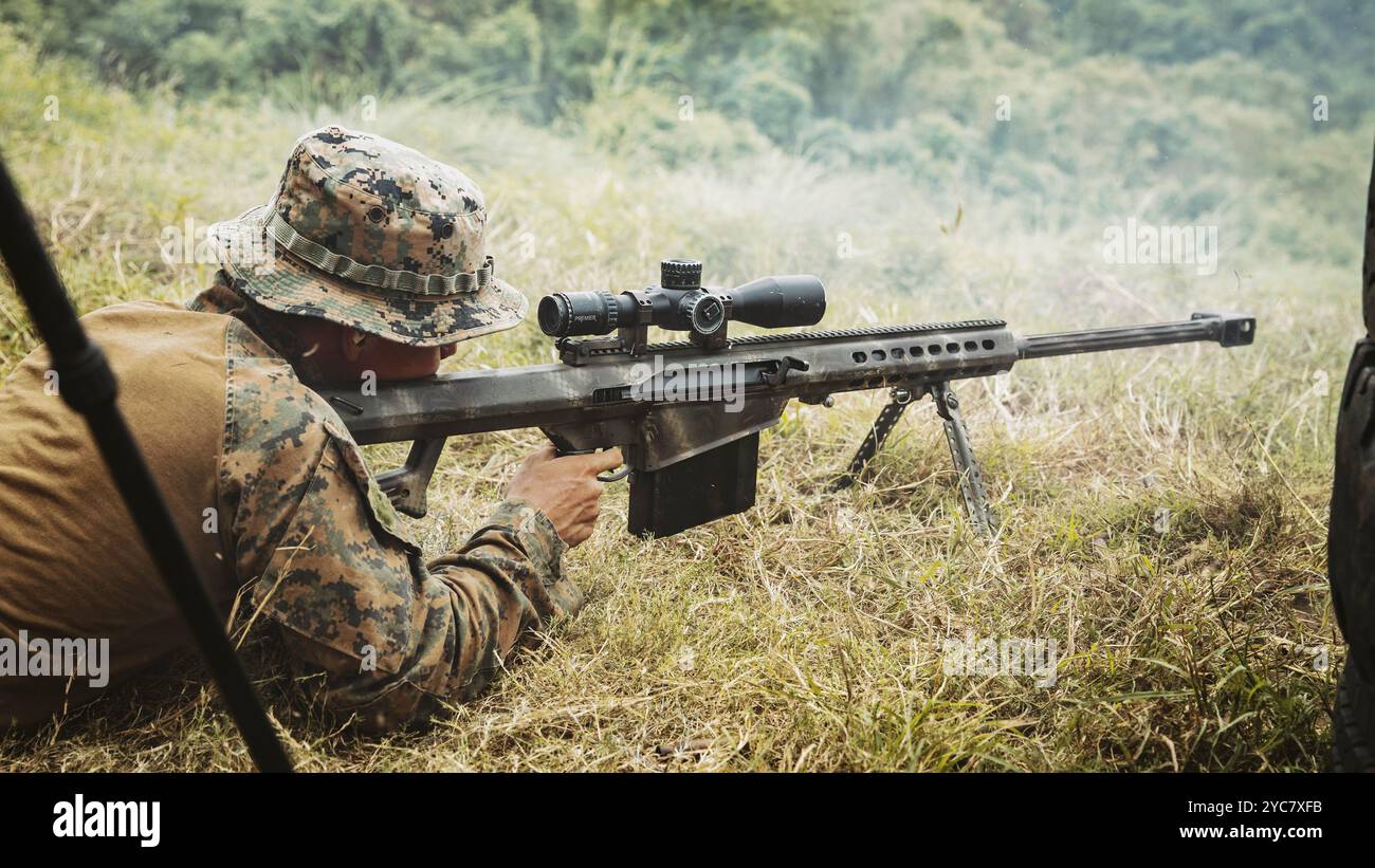 A U.S. Marine assigned to Weapons Company, Battalion Landing Team 1/5 ...