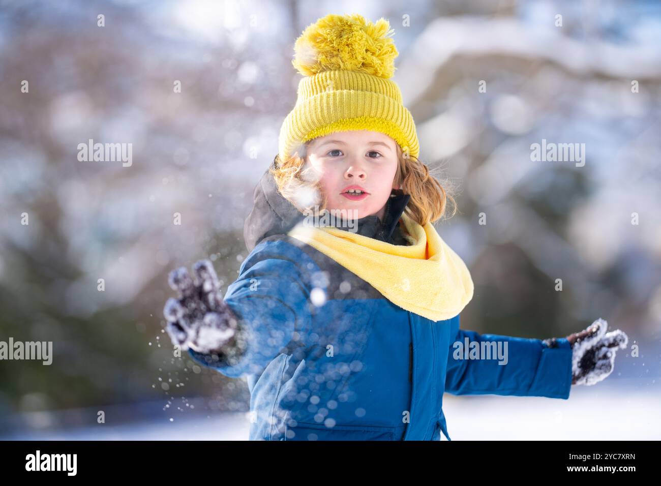 Happy kids playing snowball fight hi-res stock photography and images ...