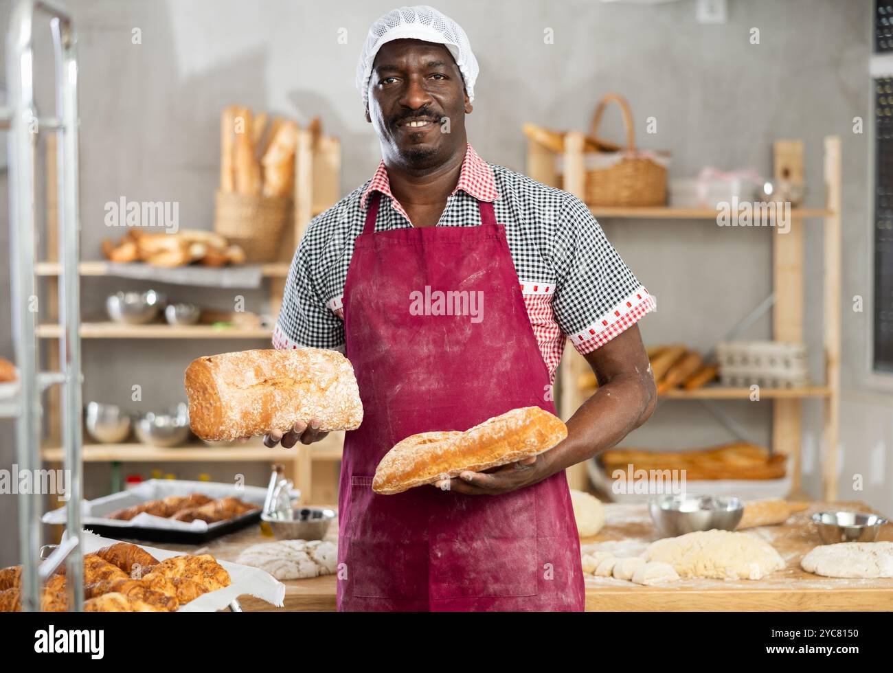 Smiling african artisan baker hi-res stock photography and images - Alamy