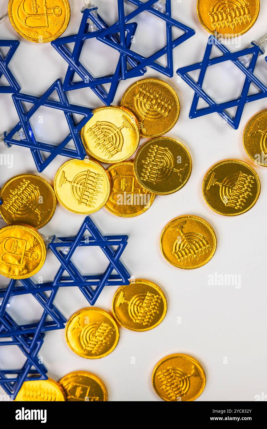 Gold Gelt and Blue Stars of David on White Background. Hanukkah ...