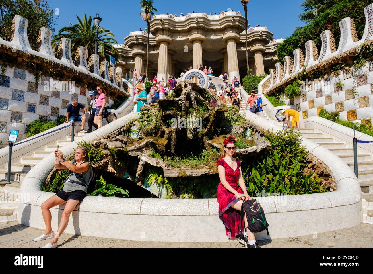 Mass tourism, overtourism, busy Parc Güell by Antoni Gaudí, escalinata ...