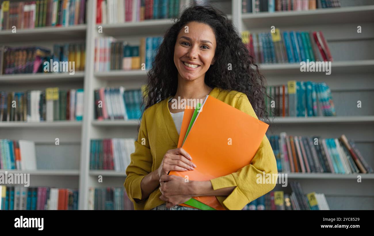 Latino Arabian woman female student learn calling inviting hand gesture study educate high ...