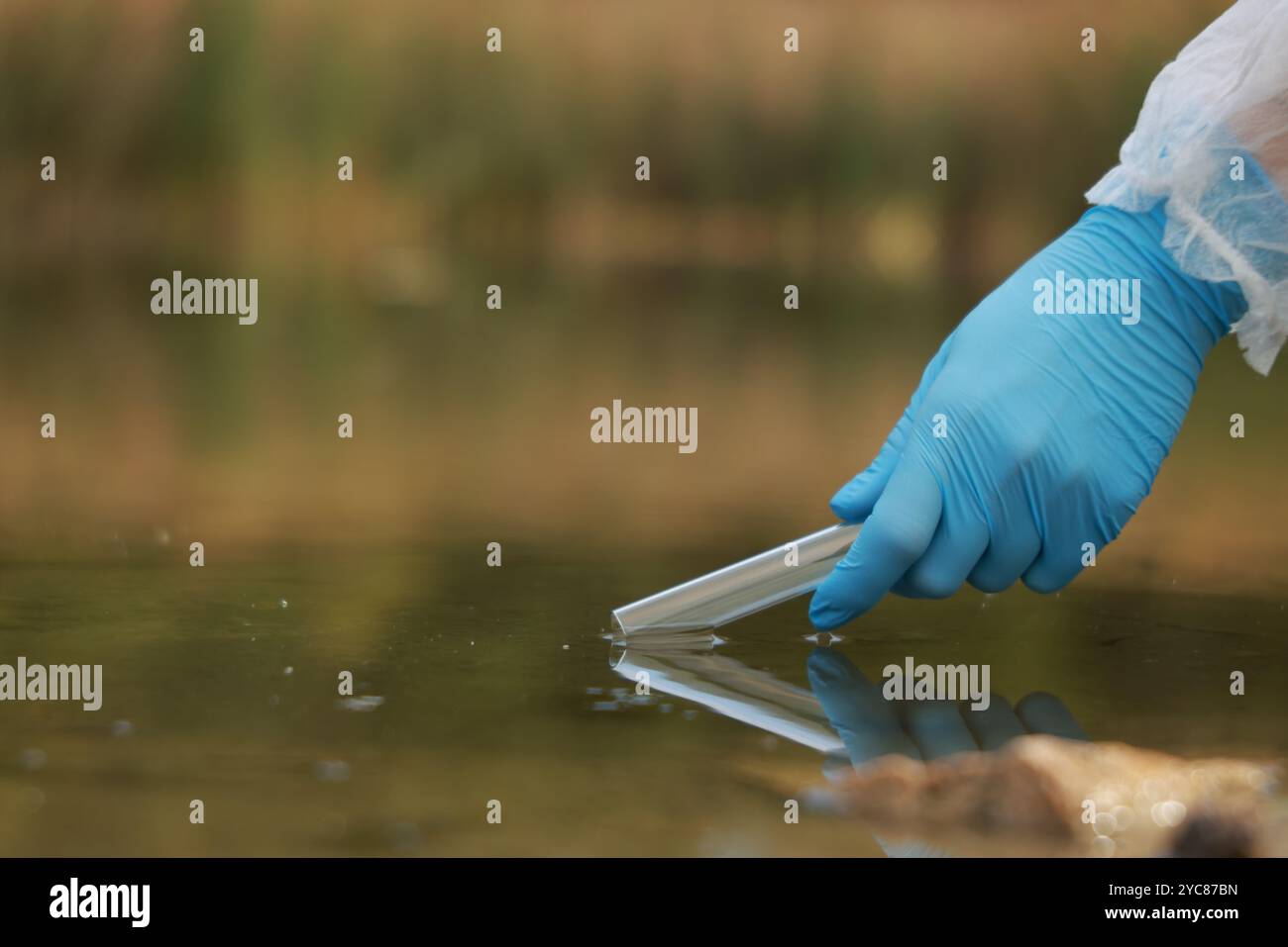 Taking sample from pond hi-res stock photography and images - Alamy