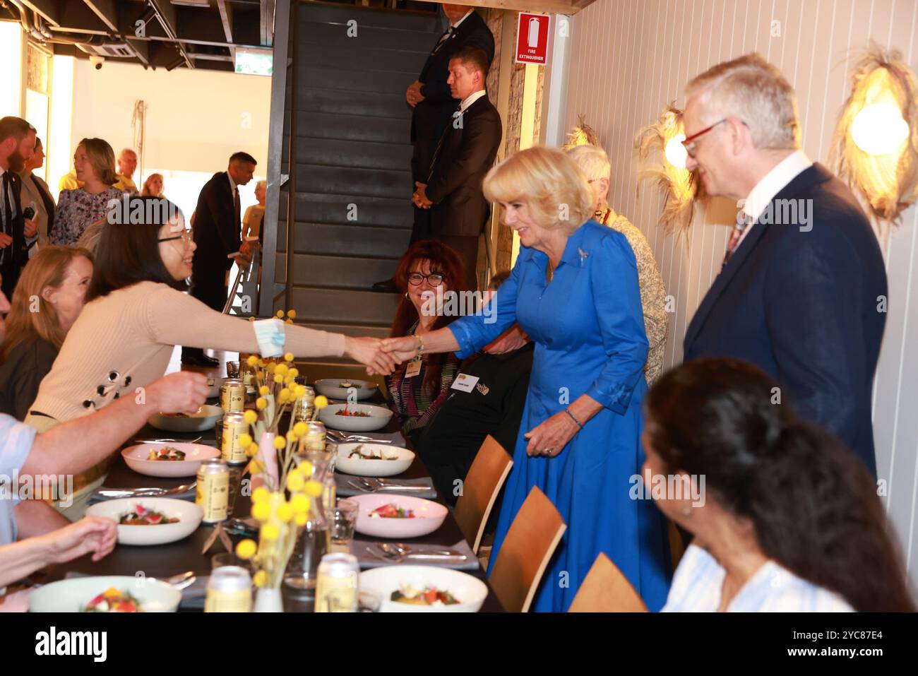 Queen Camilla greets guests during a visit to Refettorio OzHarvest ...