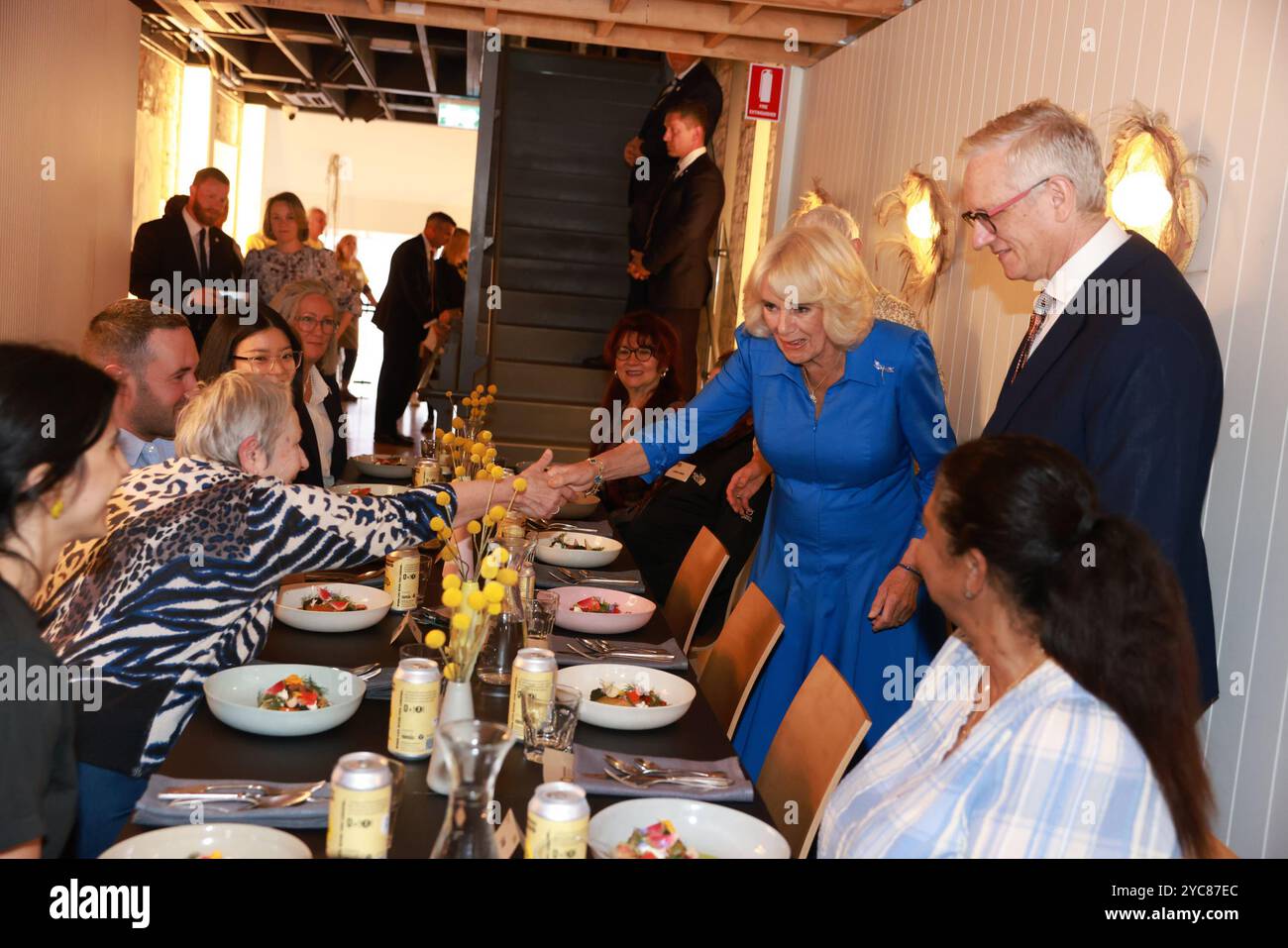Queen Camilla greets guests during a visit to Refettorio OzHarvest ...