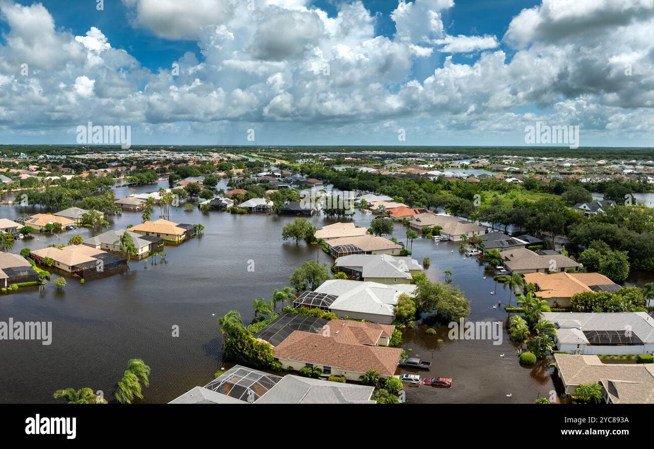 Flooded residential area with underwater cars and houses from hurricane ...