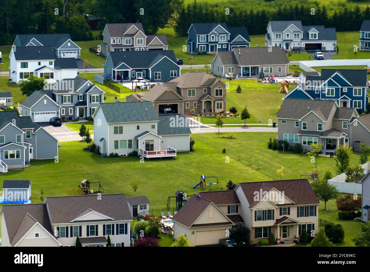 Low-density two story private homes with large lot size and green ...