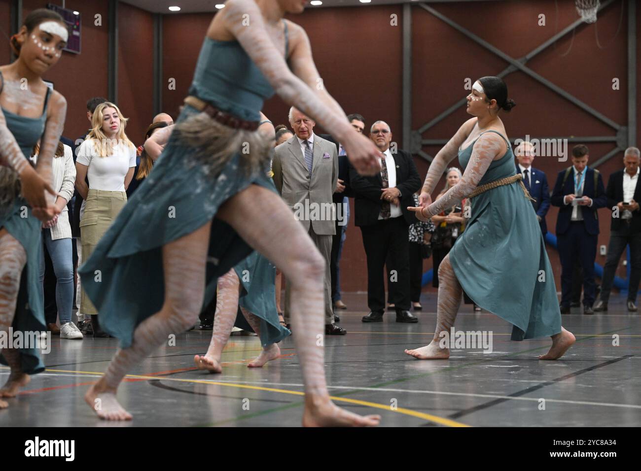 King Charles III watches members of the Indigenous community perform ...