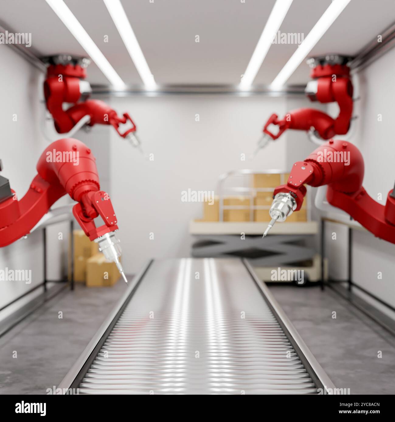 Red robotic assembly arms in a production line over a conveyor belts in ...