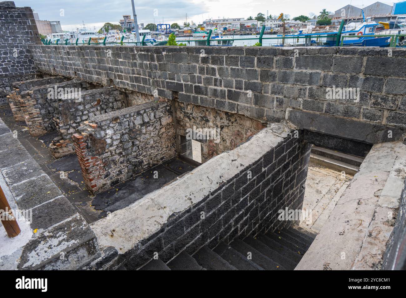 The weathered facade of a historic building at Sucre Adventure Park ...