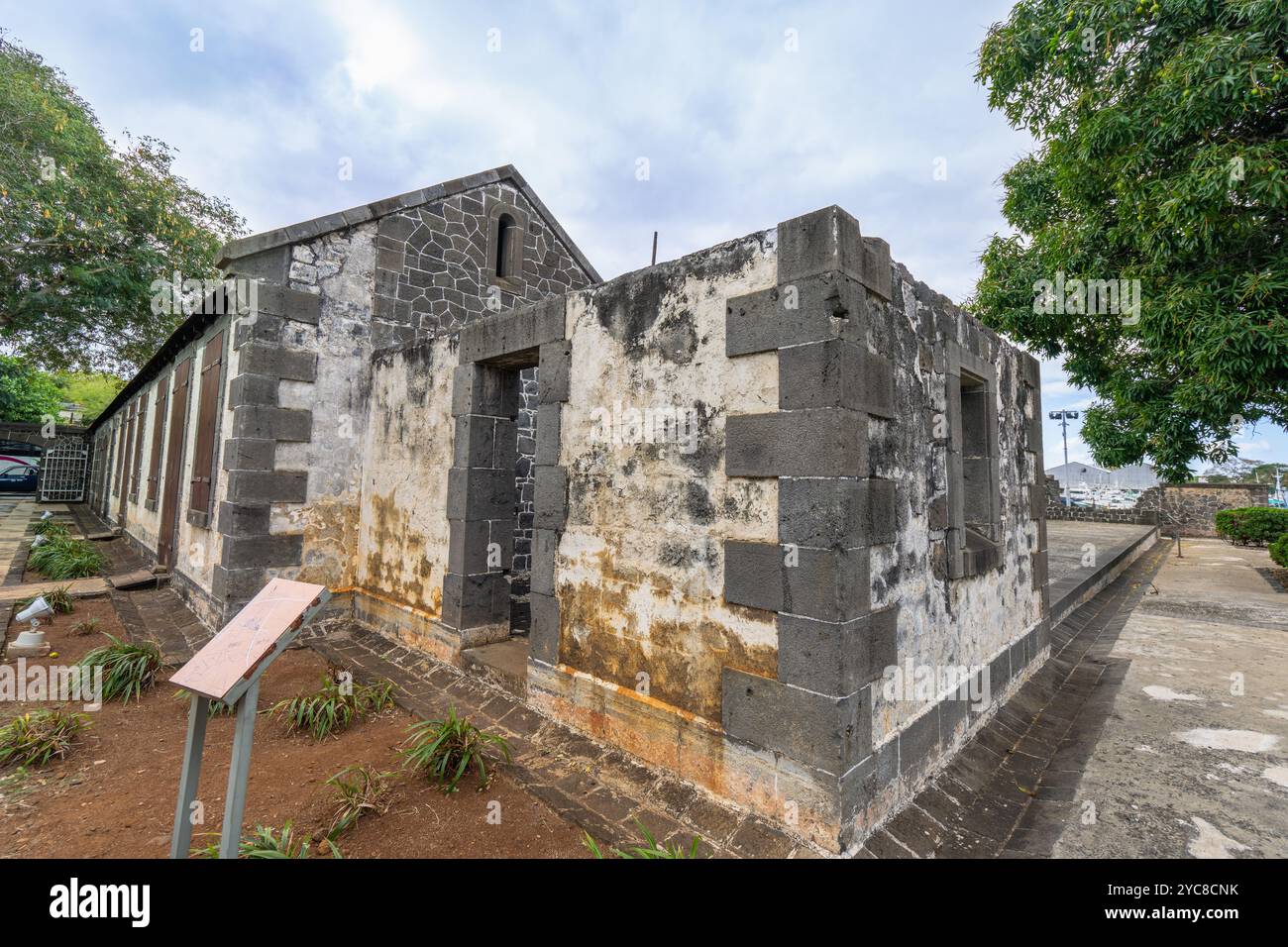The weathered facade of a historic building at Sucre Adventure Park ...