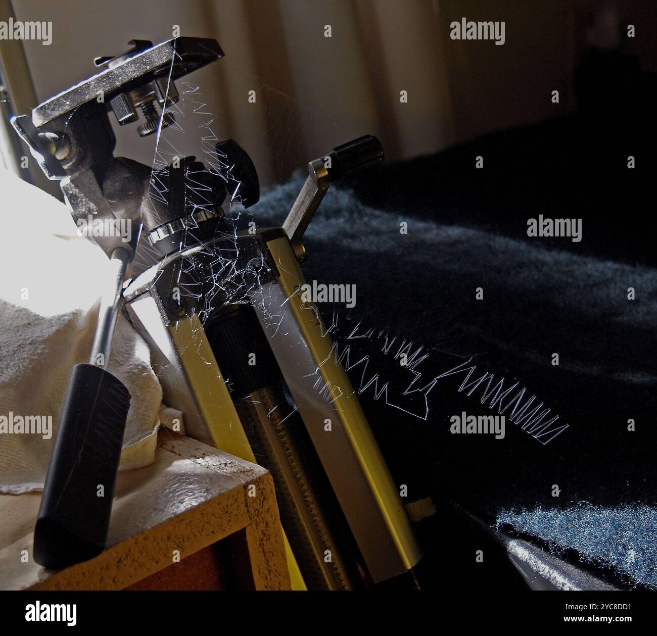 spider web on camera tripod Stock Photo - Alamy