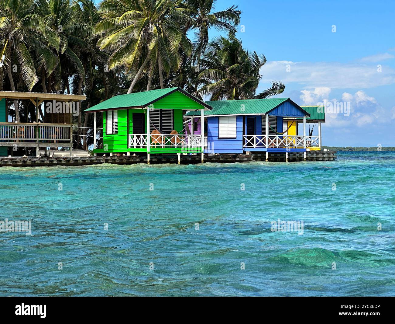 Cabins of the Paradise Tobacco Caye Resort on Tobacco Caye, Belize ...